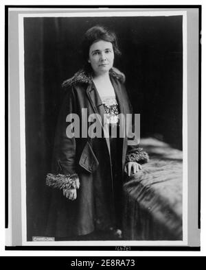 Miss Anne Martin, three-quarter length portrait, standing, facing front ...