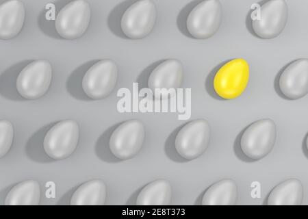 Illuminating and Ultimate Gray background. gray eggs on a yellow ...