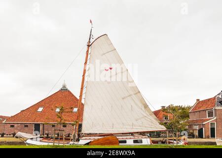Classic vintage wooden Dutch sailing ship botter type under sail ...
