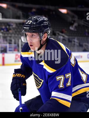 St. Louis Blues' Niko Mikkola (77) works the puck alongside Brandon ...