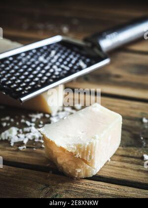 parmesan and cheese slicer Stock Photo - Alamy