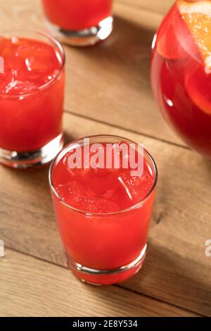 fresh fruit punch refreshing summer drink over white rustic wood table ...