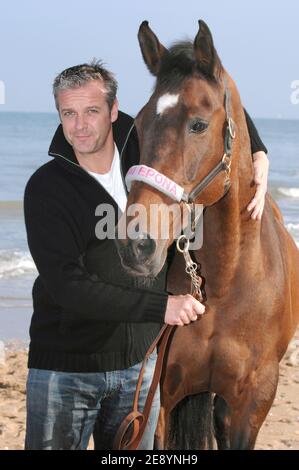 David Brecourt poses for pictures during a photocall at the 14th annual ...