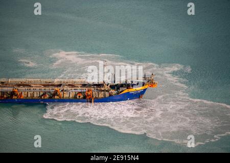 Suction Dredger Emptying Sluices, Spoiling Water of Gulf with mud Spot ...