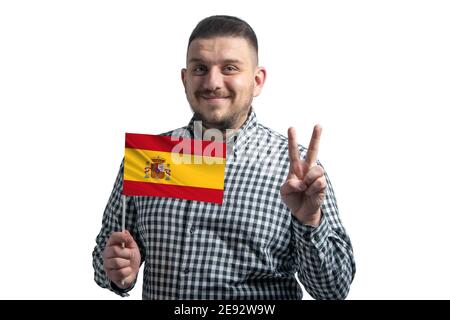 White guy holding a flag of Spain and shows the class by hand isolated ...