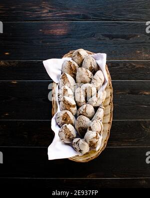 Small rye bread loafs in a basket at a restaurant Stock Photo - Alamy