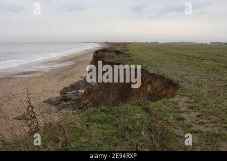 Sea cliffs of boulder clay in front of beaches. Clay Cliffs and Beach ...