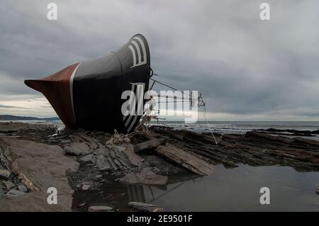Ship wrecked sailing yacht stranded on the rocks at Andratx Harbour ...