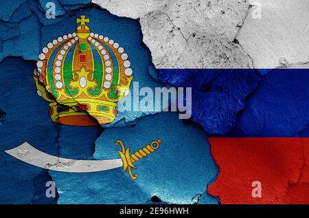 Flags of Astrakhan Oblast and Russia painted on cracked wall Stock ...