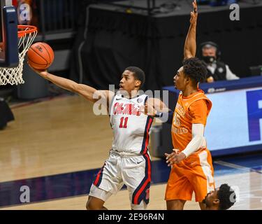 Tennessee guard Keon Johnson (45) puts up a shot around Auburn center ...