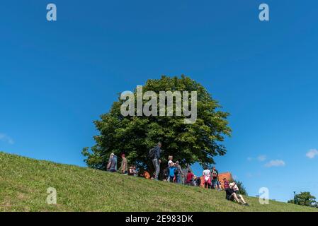 People on the flood embankment, Greetsiel, Lower Saxony, Germany ...