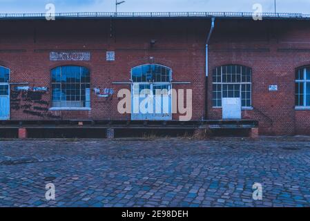 The loading ramp of an old warehouse, loading ramp and a sliding gate ...