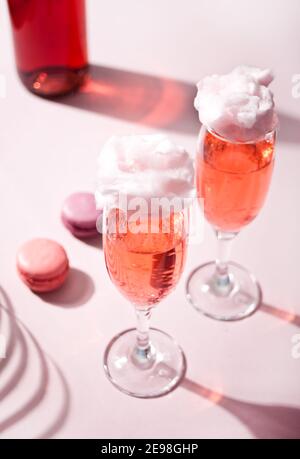 Glasses with delicious cotton candy cocktail on light background Stock ...