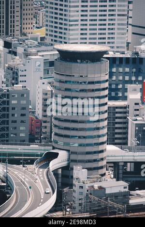 Osaka skyline with highway through its building at night, Japan Stock ...