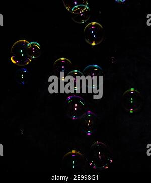 Soap bubbles, abstract background. dark background indoors Stock Photo ...