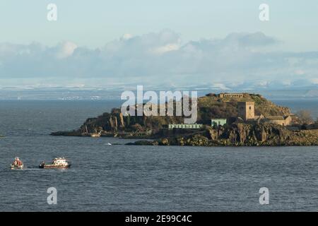 A tug boat sitting near Inchcolm Island, Firth of Forth, Scotland Stock Photo - Alamy