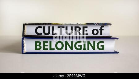 Culture of belonging symbol. Books with words 'culture of belonging' on ...