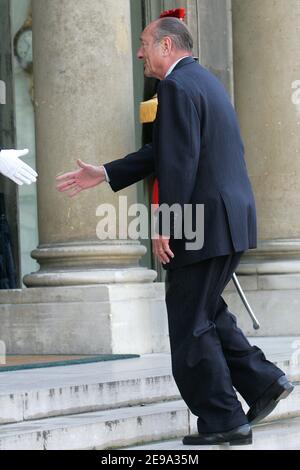President Jacques Chirac receives former US President George Bush at ...