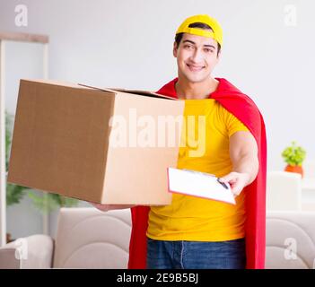 Superhero delivery guy with box Stock Photo - Alamy