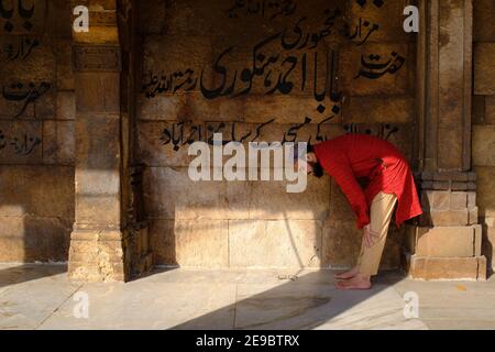 A Muslim man offering prayers at Jama mosque of Ahmedabad Stock Photo ...