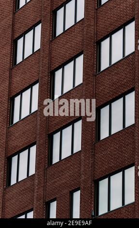 A vertical shot of a modern building with beautifully designed ...