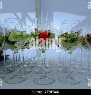 Delicious salad mix in verrines on black backgrounds isolated Stock ...