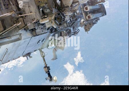 Astronaut Joseph R. Tanner, STS-115 mission specialist, waves toward ...