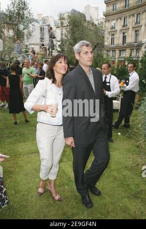 "French actress Sophie Marceau and husband producer Jim Lemley pose ...
