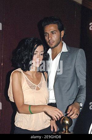 French singer Jenifer and her boyfriend Maxime at the premiere of ...