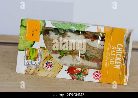 Chicken salad sandwiches for lunch pack with crisps Stock Photo - Alamy