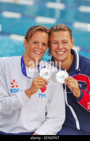 France's Laure Manaudou and Esther Baron during a training session ...