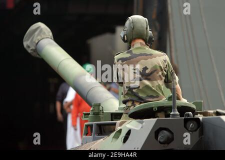 French troops prepare to load 13 Leclerc tanks and dozens of other ...