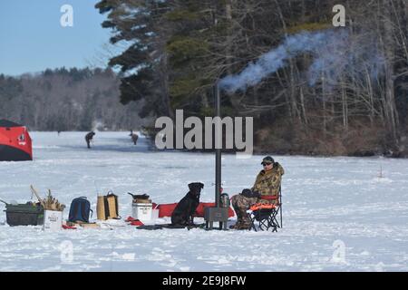 Hubbardston, Massachusetts, USA. 31st Jan, 2021. Ice Fishermen Spend ...