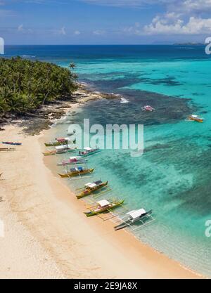 Daku Island, Siargao, Philippines - Tropical beach with blue water and ...