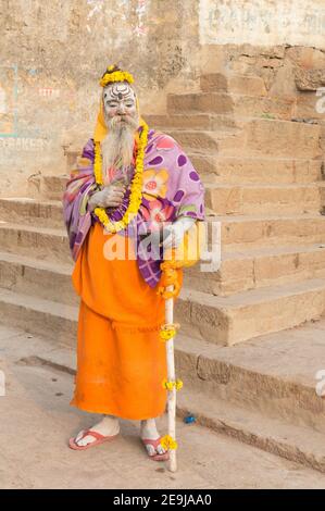 Mural of an Indian Sadhu, holy man, with chillum, pipe for smoking hash ...