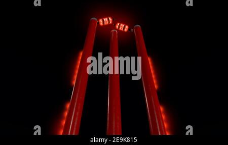 Red electronic cricket wickets with dislodging bails and illuminating ...