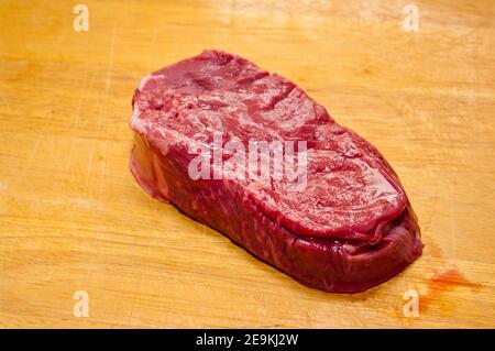 Fresh raw beef meat fillet shish kebab on skewers.Kiwi soaked meat ...