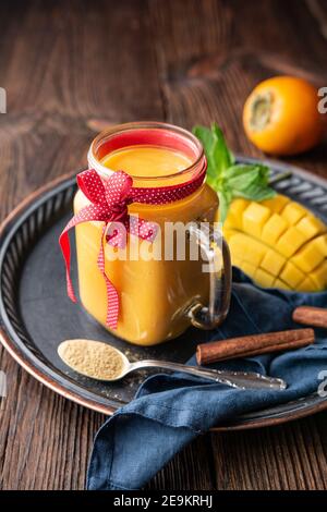 Healthy breakfast, snack. Spicy smoothie with apple, honey, oatmeal ...