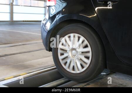 Car on the brake test bench (brake test Stock Photo - Alamy