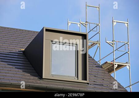 Dormer with zinc cladding on a tiled roof Stock Photo - Alamy