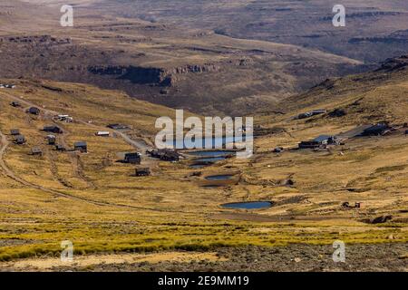Basotho village with houses (mokhoro) in traditional Lesotho rondavel ...