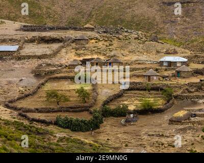 Basotho village with houses (mokhoro) in traditional Lesotho rondavel ...
