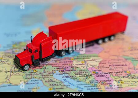 Truck with trailer on the Europe map Stock Photo - Alamy