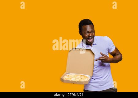 Handsome african bearded courier with 4 pizza boxes. 2+2 Big discount ...