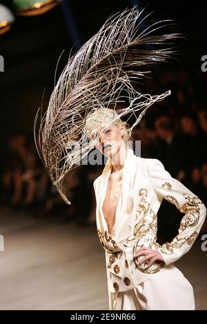 A model displays a creation by British designer John Galliano for his ...