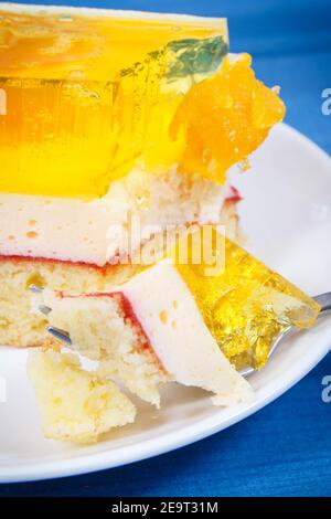 Fresh creamy sweet sponge cake with different layers and jelly ...