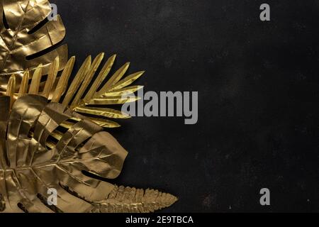 Gold tropical palm leaves on white background. Flat lay, top view ...