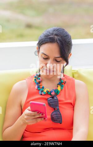 woman with unhappy facial expression holding her head migraine pain ...