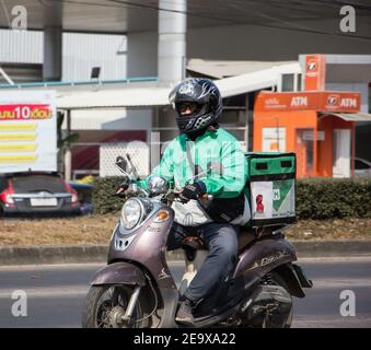 Chiangmai, Thailand - January 5 2021: Delivery service man ride a ...