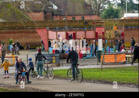 A busy children’s playground / play area with parents and young ...
